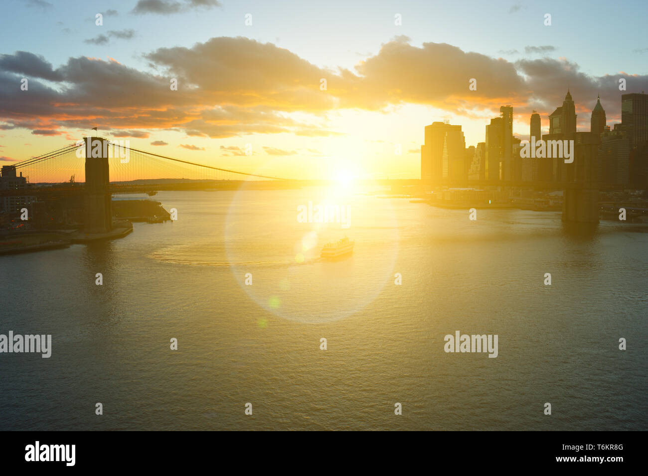 Beautiful sunset over a Manhattan with Brooklyn Bridge Stock Photo - Alamy