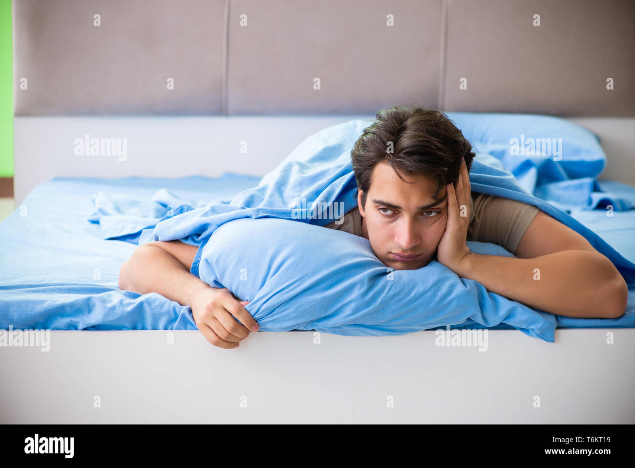 Man suffering from sleeping disorder and insomnia Stock Photo - Alamy