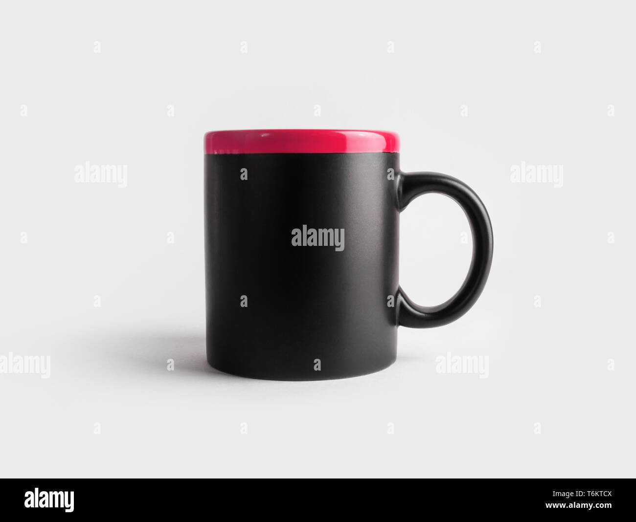 Black and red mug Stock Photo - Alamy