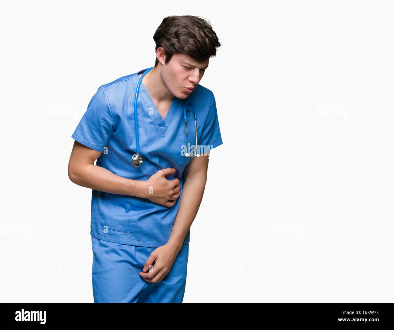 Young doctor wearing medical uniform over isolated background with hand ...