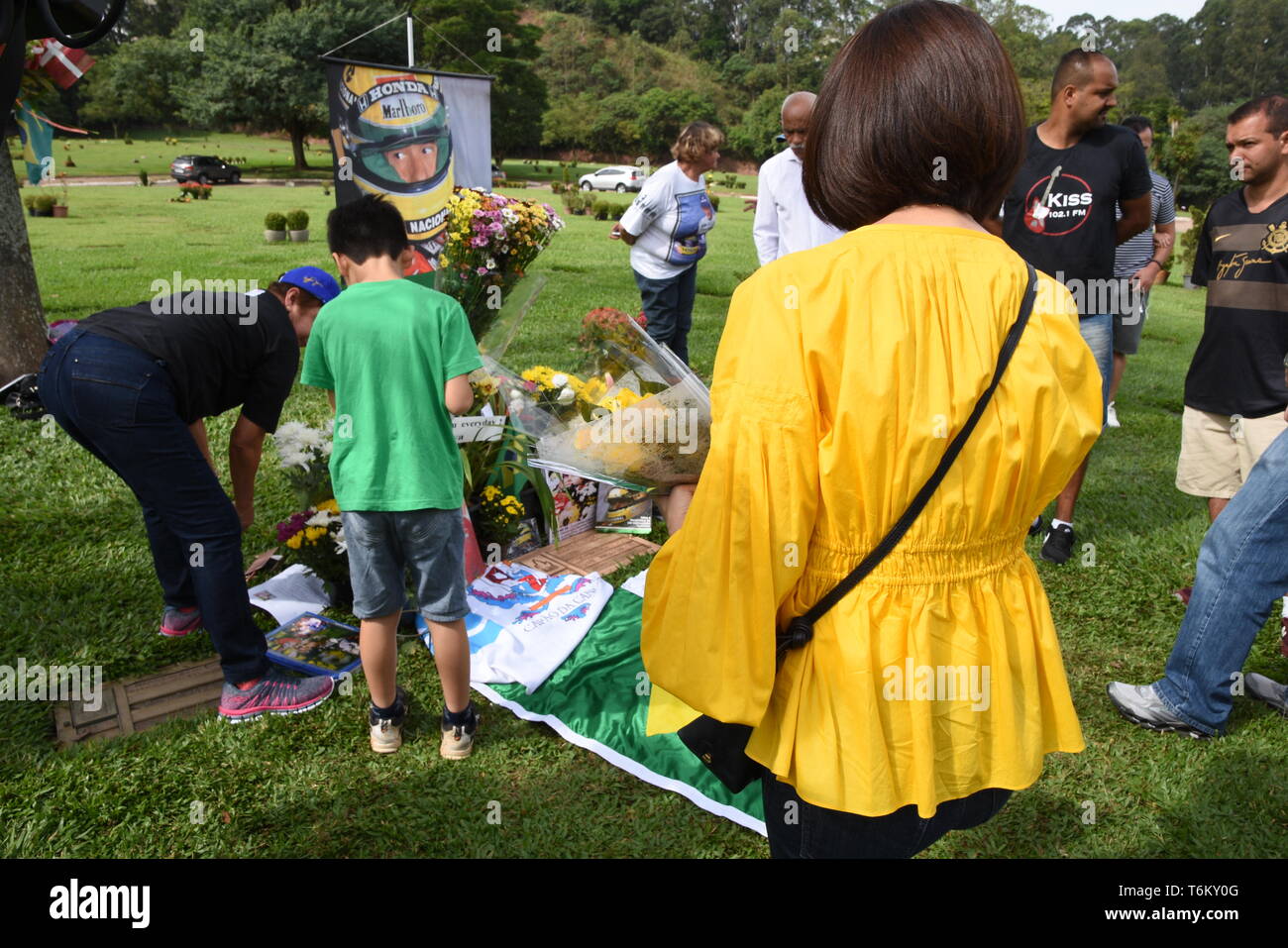 Fans visit the tomb of Formula 1 driver Ayrton Senna at Morumbi ...