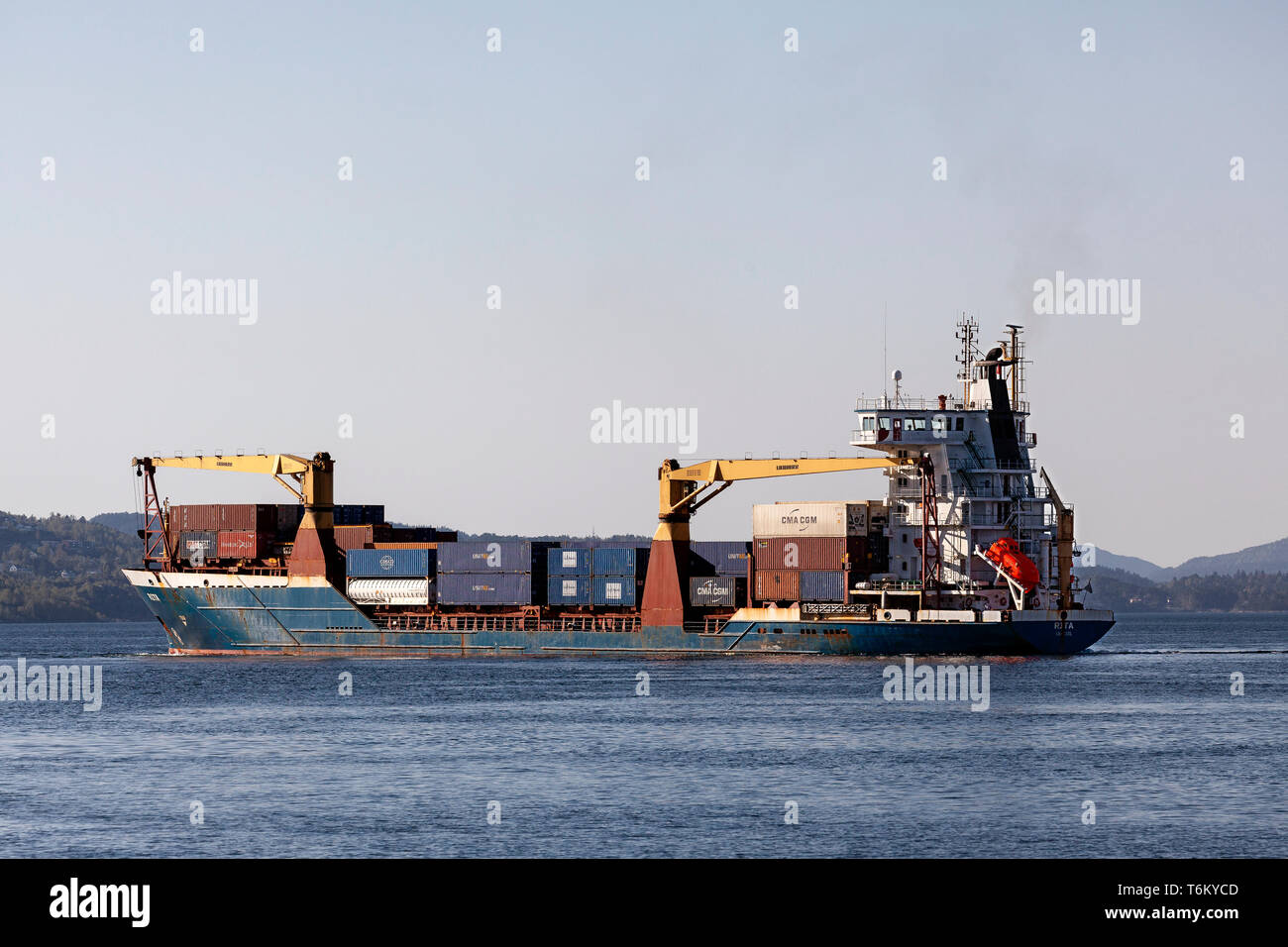 General cargo and container vessel Rita at Byfjorden, departing from ...