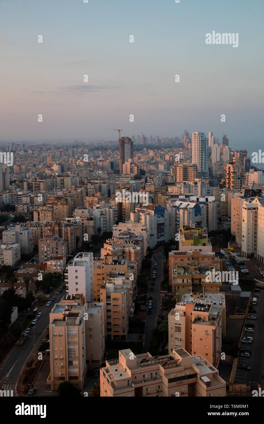 Aerial view of a residential neighborhood in a city during a vibrant ...