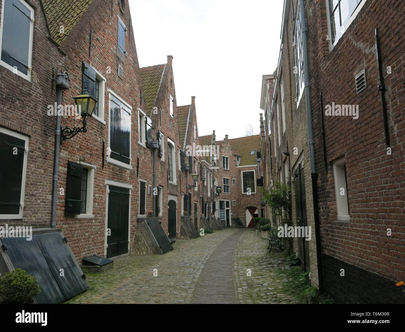 Looking along historic Kuiperspoort, a narrow cobblestoned street ...