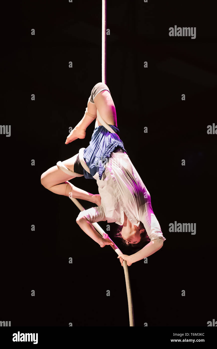 Girl upside down swing hi-res stock photography and images - Alamy