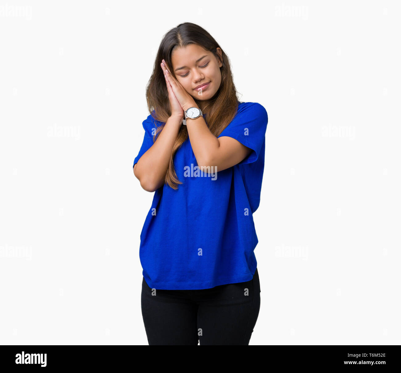 Young beautiful brunette woman wearing blue t-shirt over isolated ...