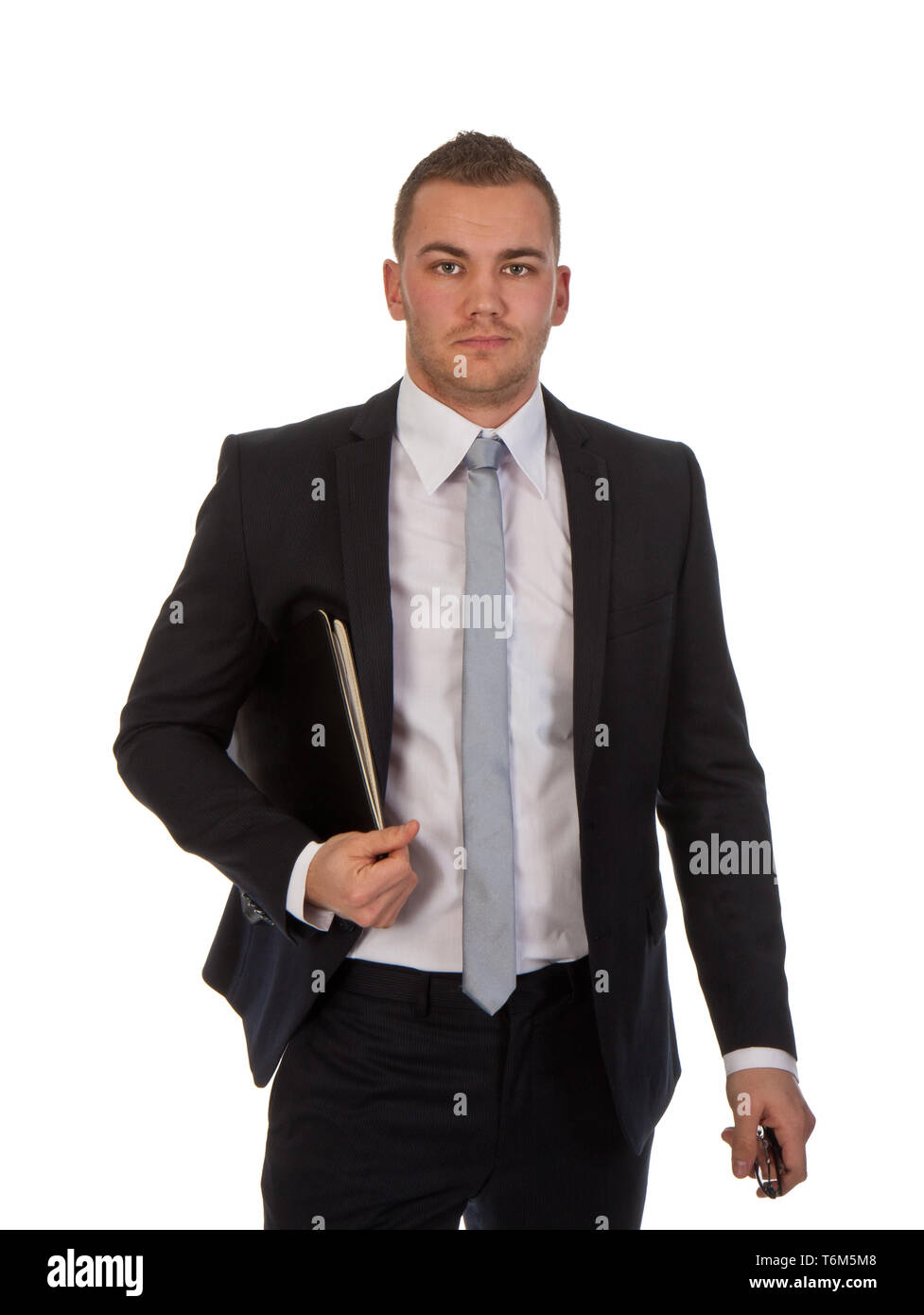 Young businessman holding documents hi-res stock photography and images ...
