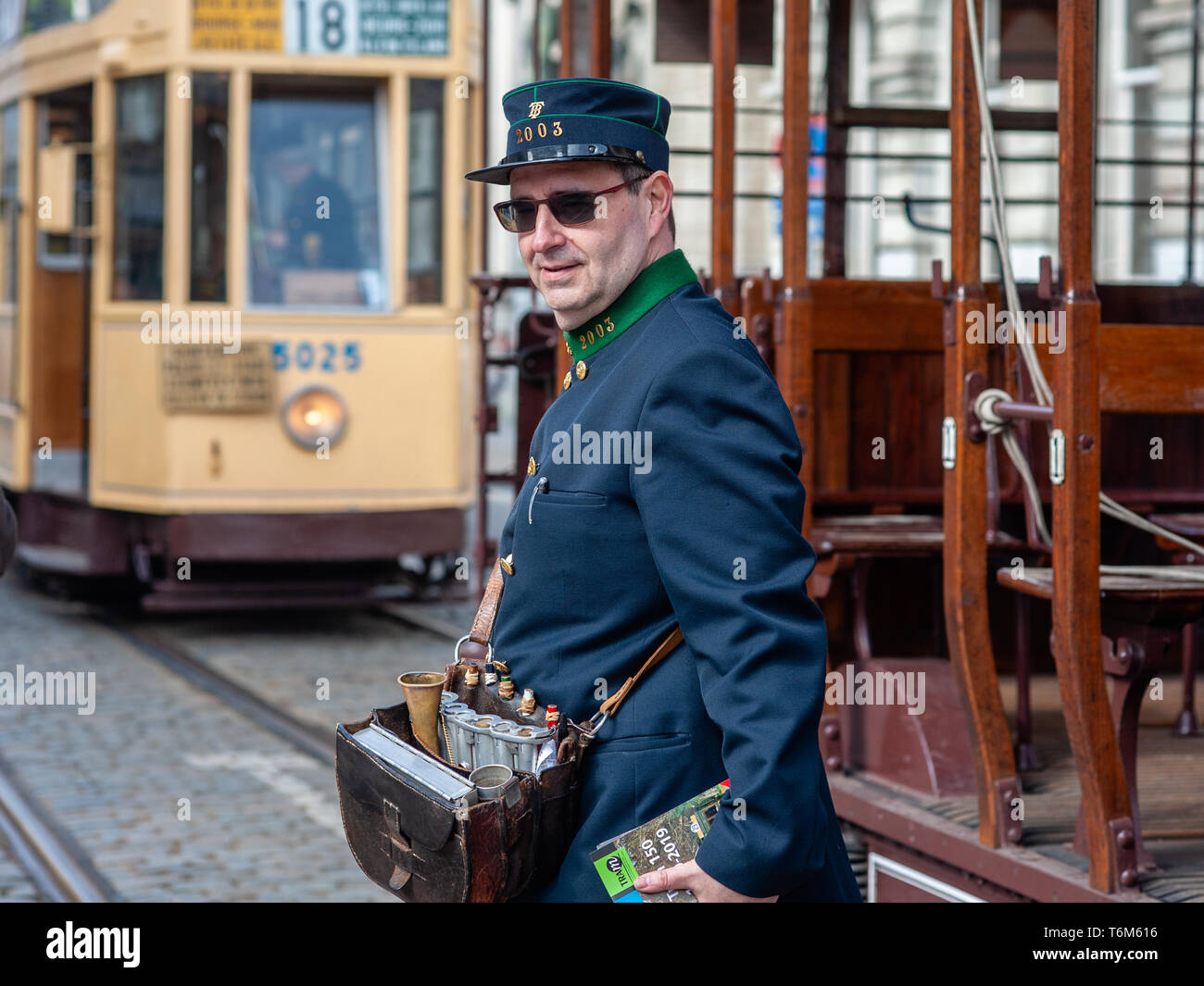 A tram driver is seen wearing vintage clothes during the festivities. A ...