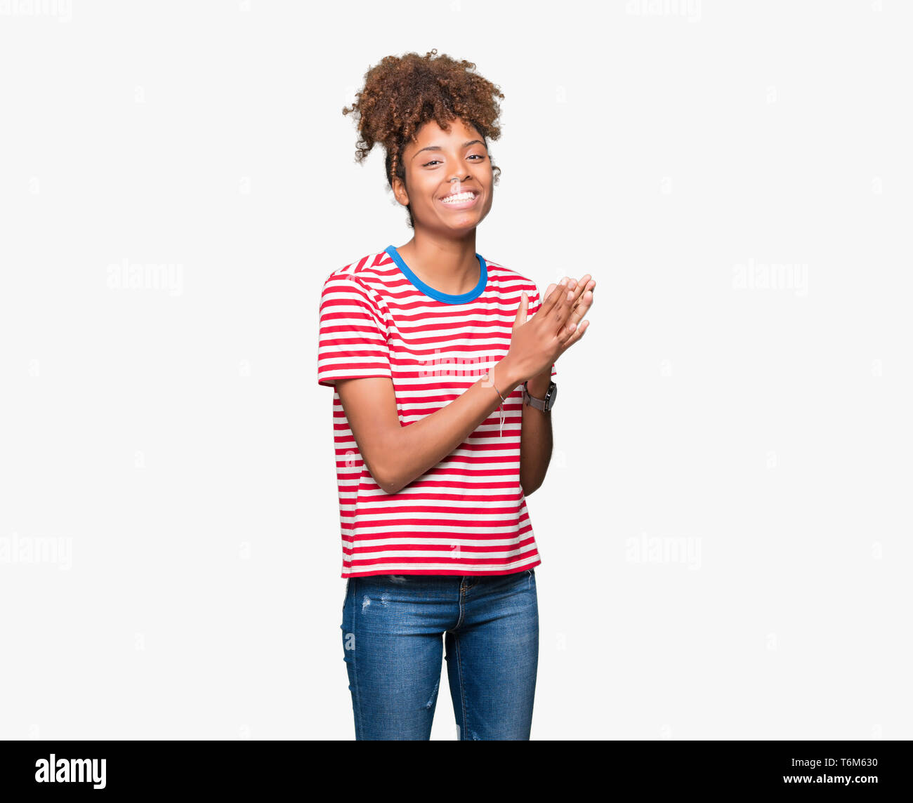 Beautiful young african american woman over isolated background ...