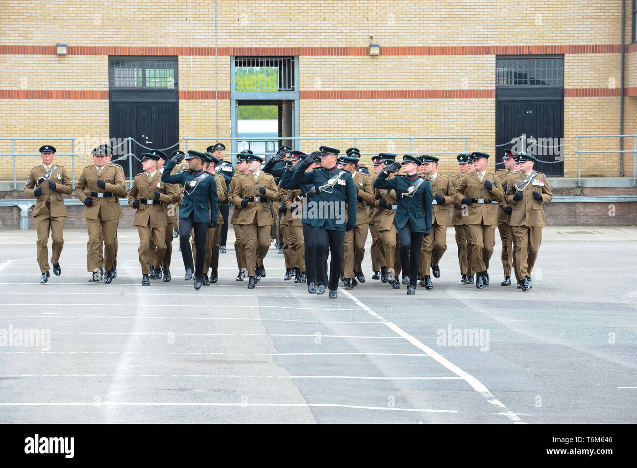 Soldiers, Officers, and Bandsmen are seen during the parade, as The ...