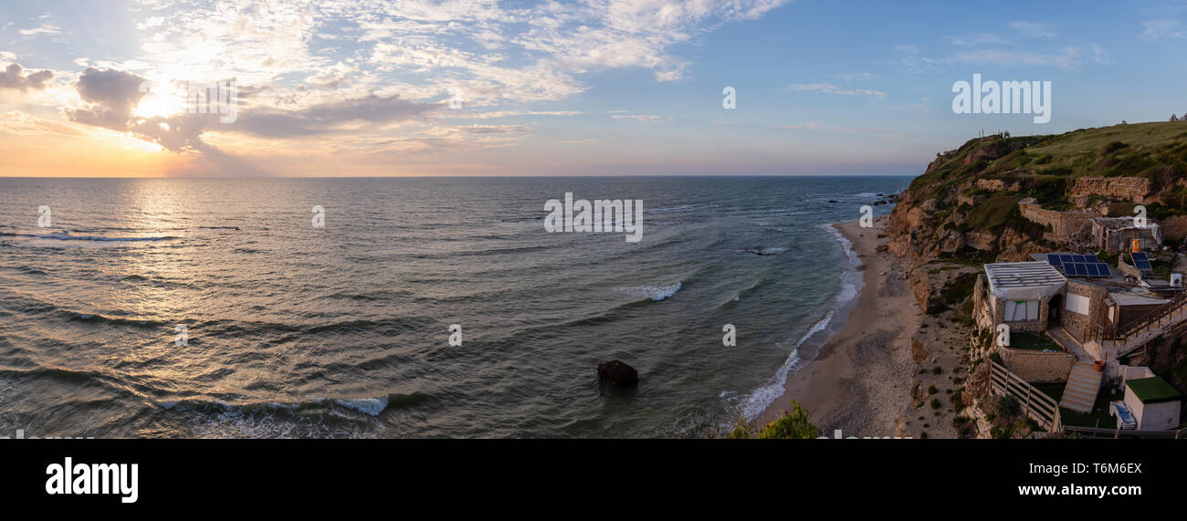 Beautiful Panoramic View on the Ocean Coast duing a vibrant sunset at ...