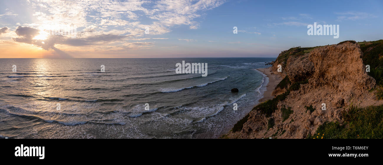 Beautiful Panoramic View on the Ocean Coast duing a vibrant sunset at ...