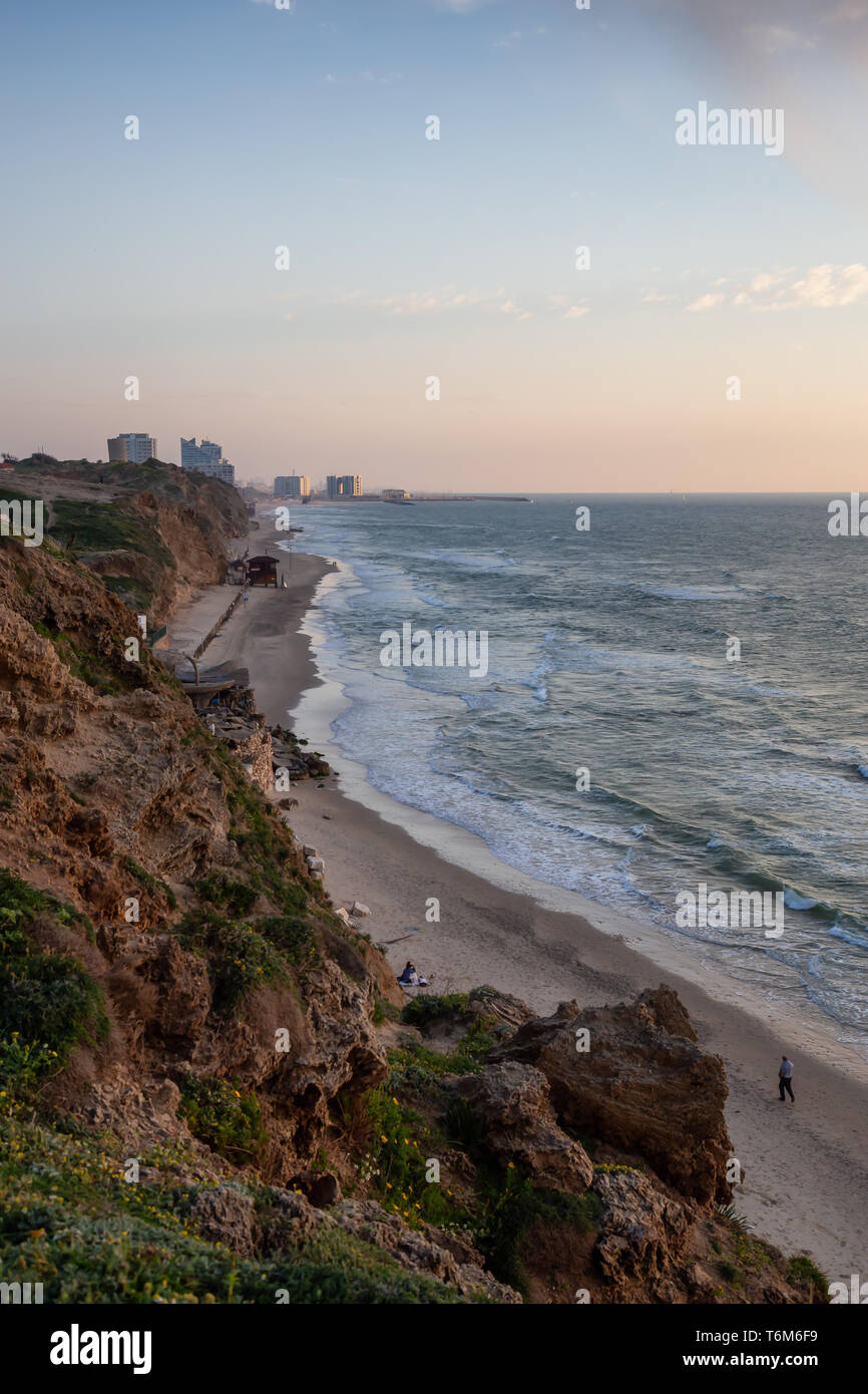 Beautiful View on the Ocean Coast duing a vibrant sunset at the ...