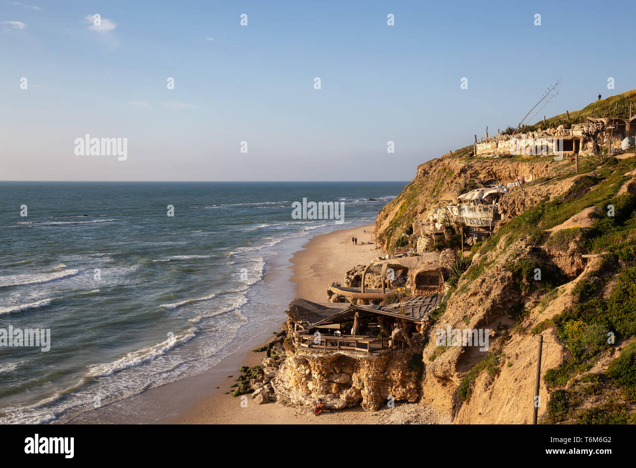 Beautiful View on the Ocean Coast duing a vibrant sunset at the ...
