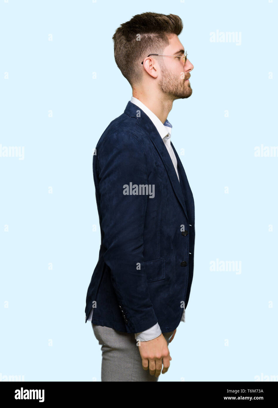 Young handsome elegant man wearing sunglasses and fashion blazer ...