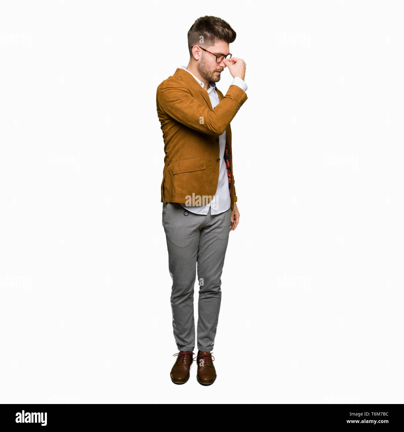 Frustrated man fatigue headache Cut Out Stock Images & Pictures - Alamy