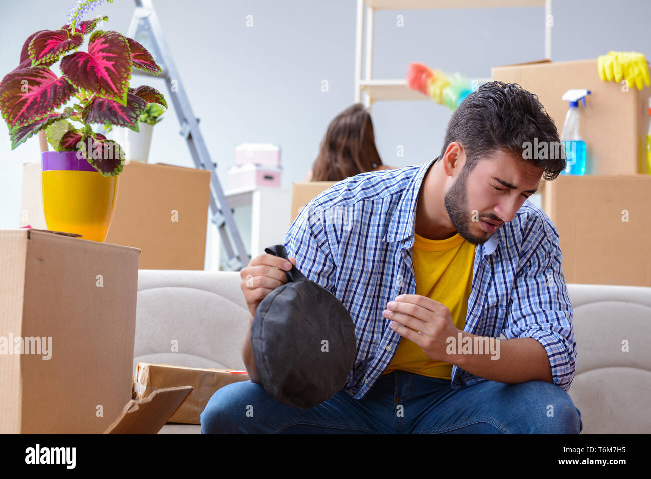 Woman packing boxes during move hi-res stock photography and images - Alamy