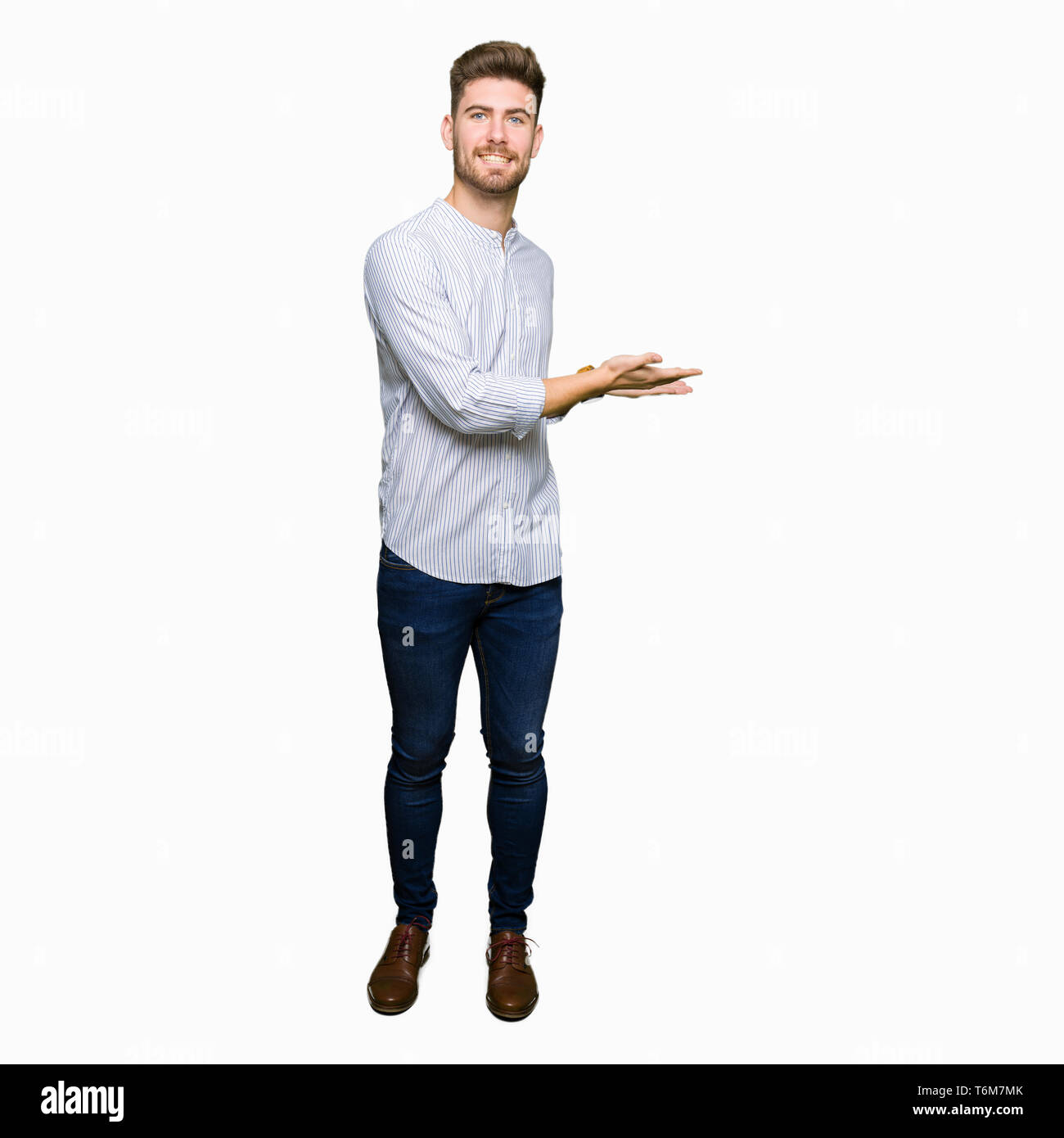 Young hispanic man open palm Cut Out Stock Images & Pictures - Alamy