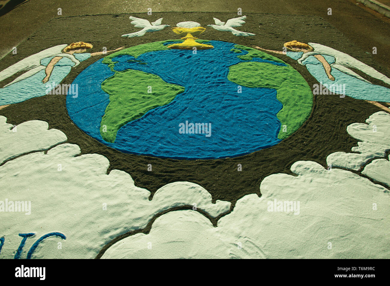 Sao Manuel, Brazil. Handmade drawing on colorful sand carpet made for ...