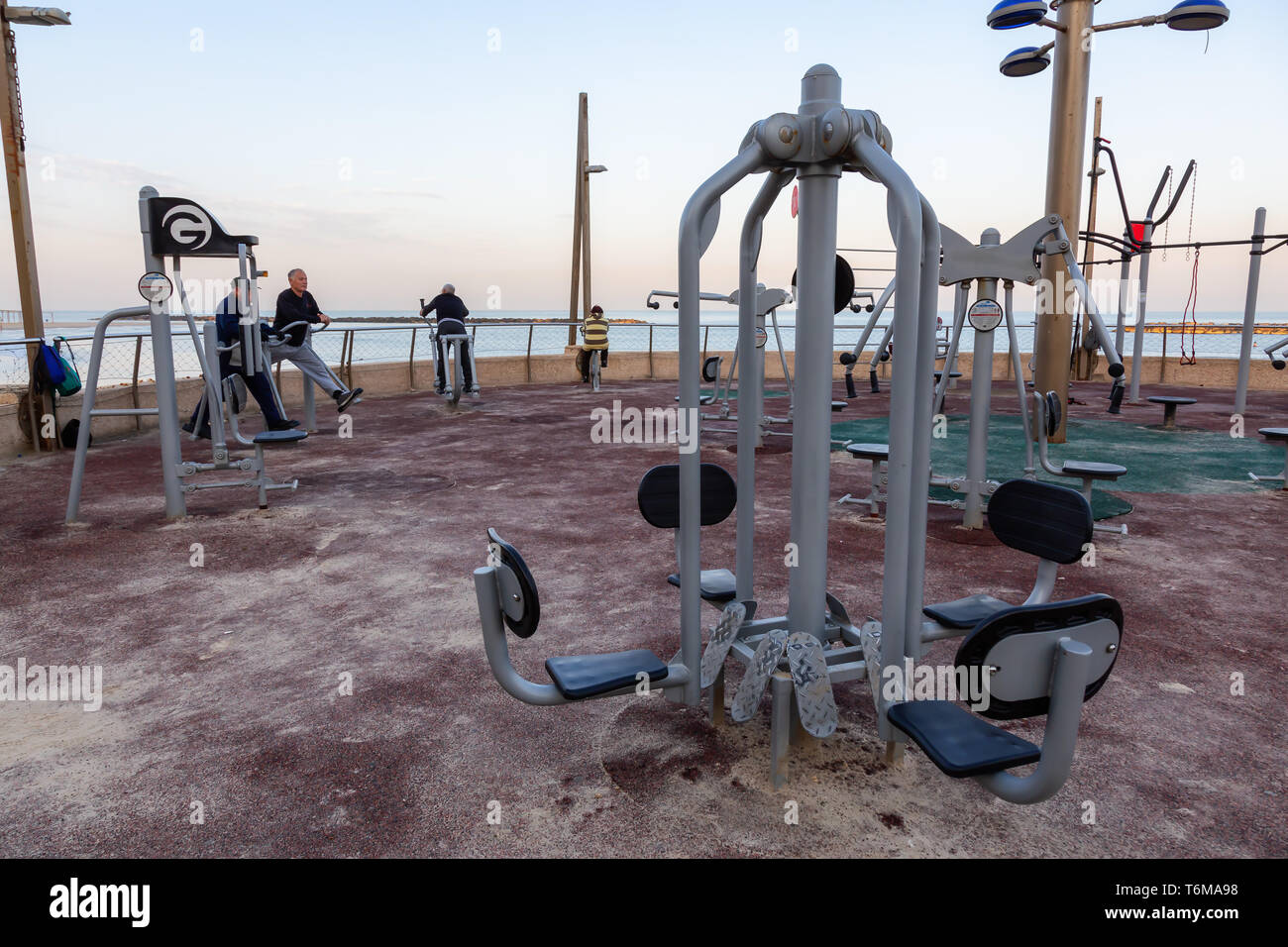 Netanya, Israel - April 3, 2019: Outdoor gym at the beach during a ...