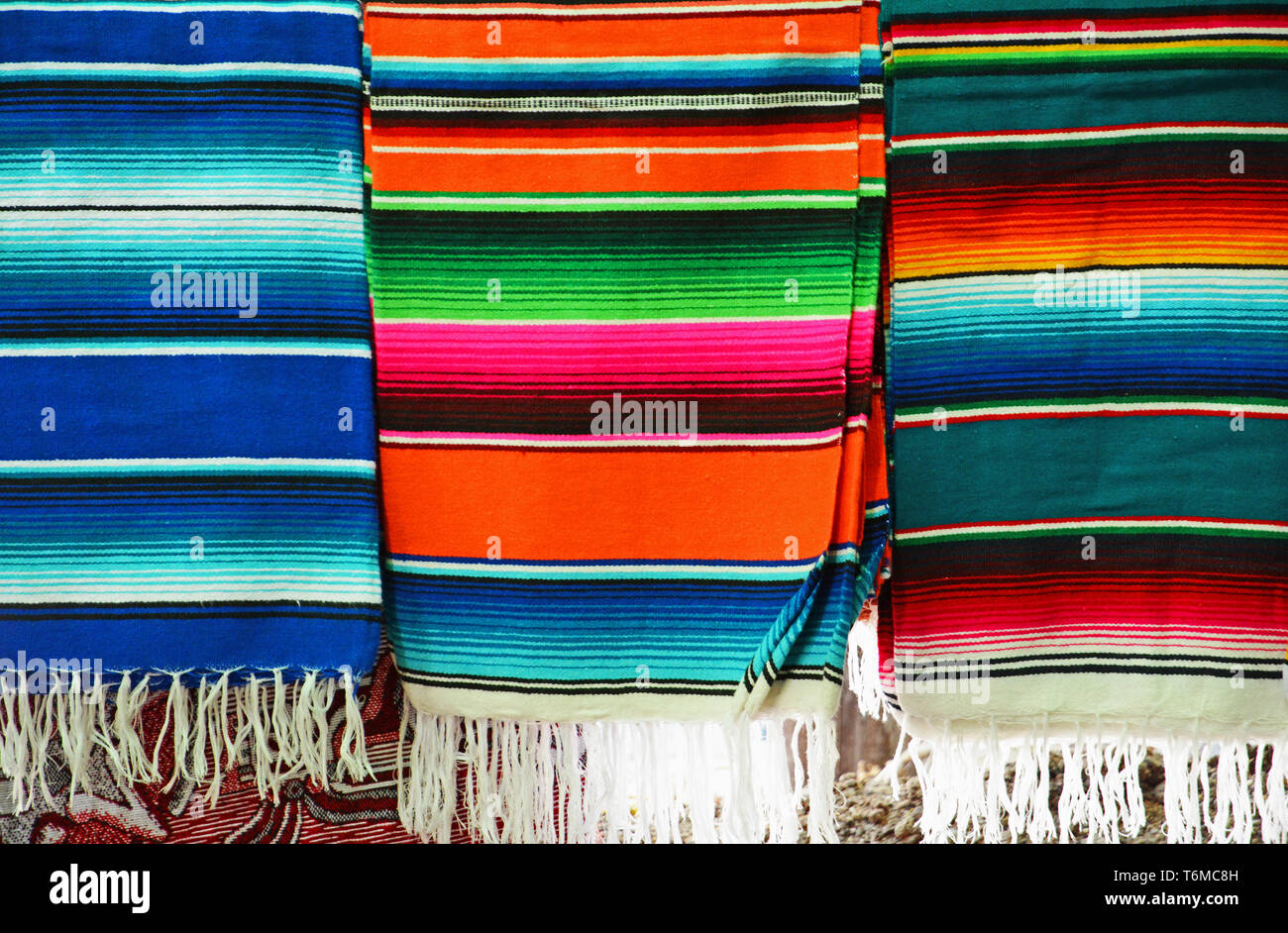 Hand made/painted colorful Mexican plates with designs on display Stock ...