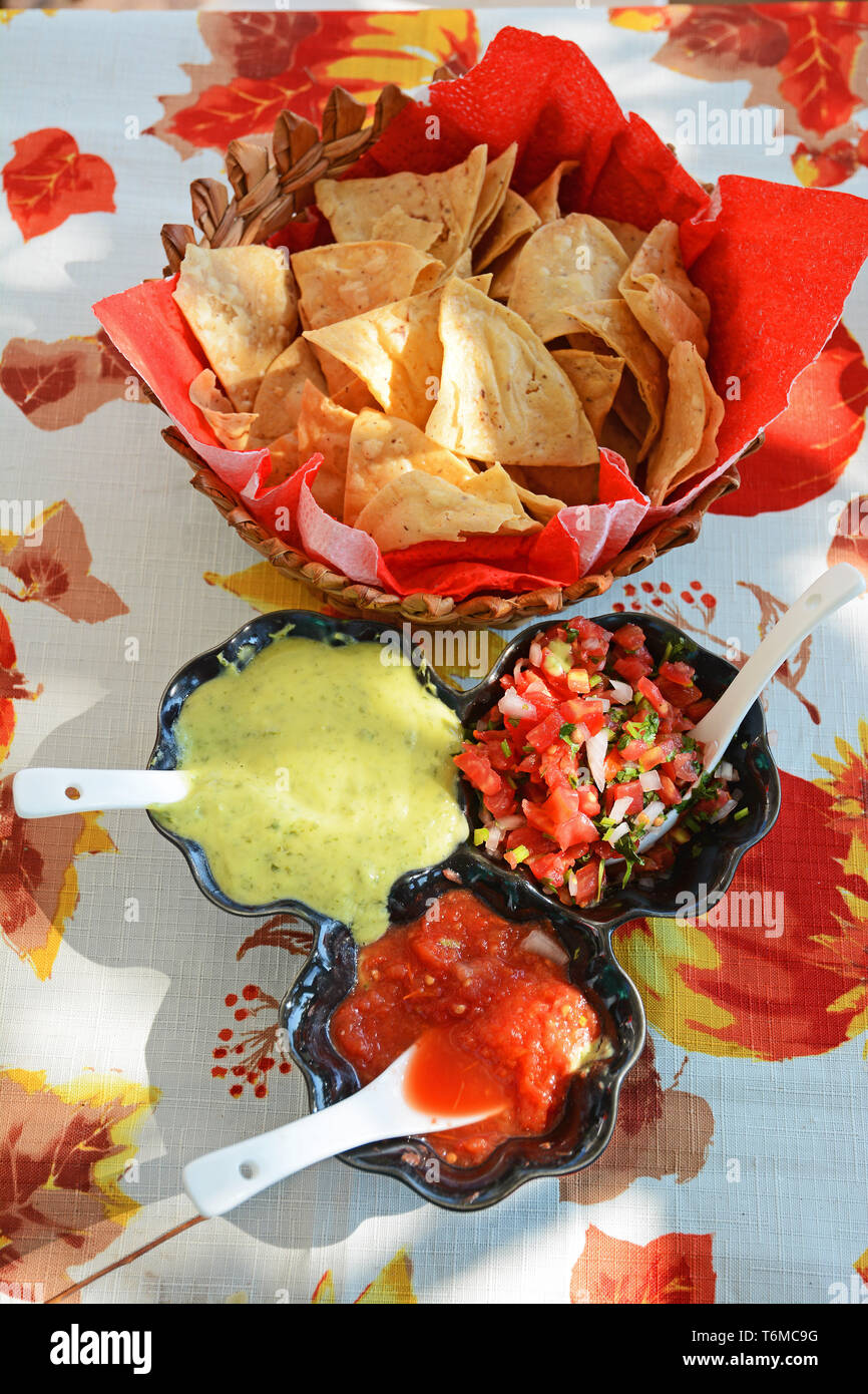 Hand made/painted colorful Mexican plates with designs on display Stock ...