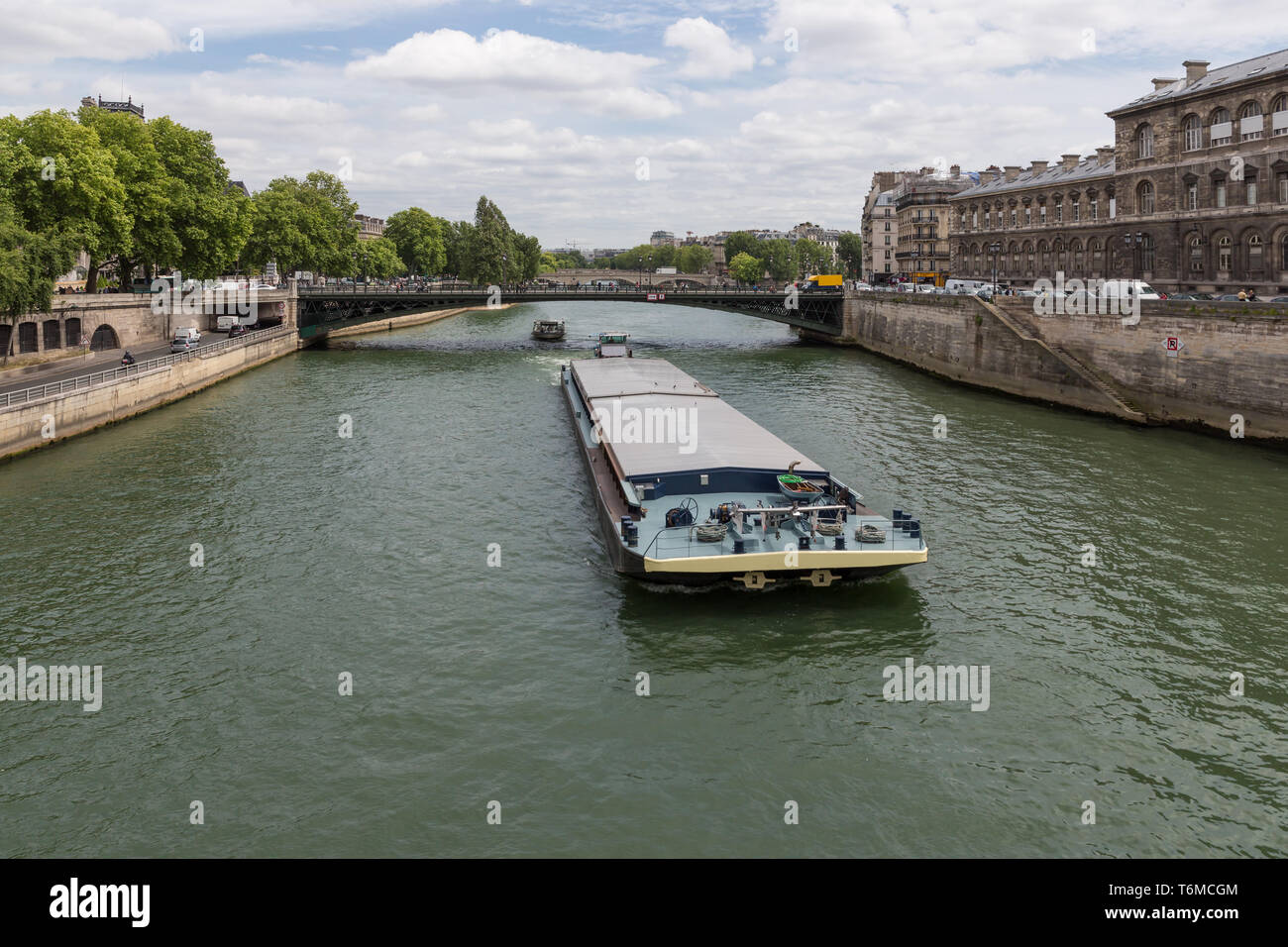 Barge at river Seine downtown in Paris, France Stock Photo - Alamy