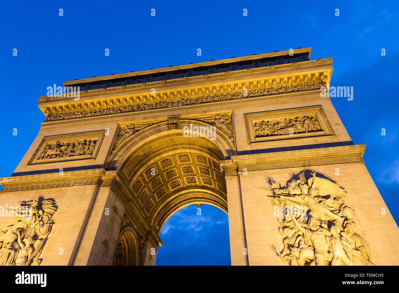 Evening view of Illuminated Arc de Triomphe in Paris Stock Photo - Alamy