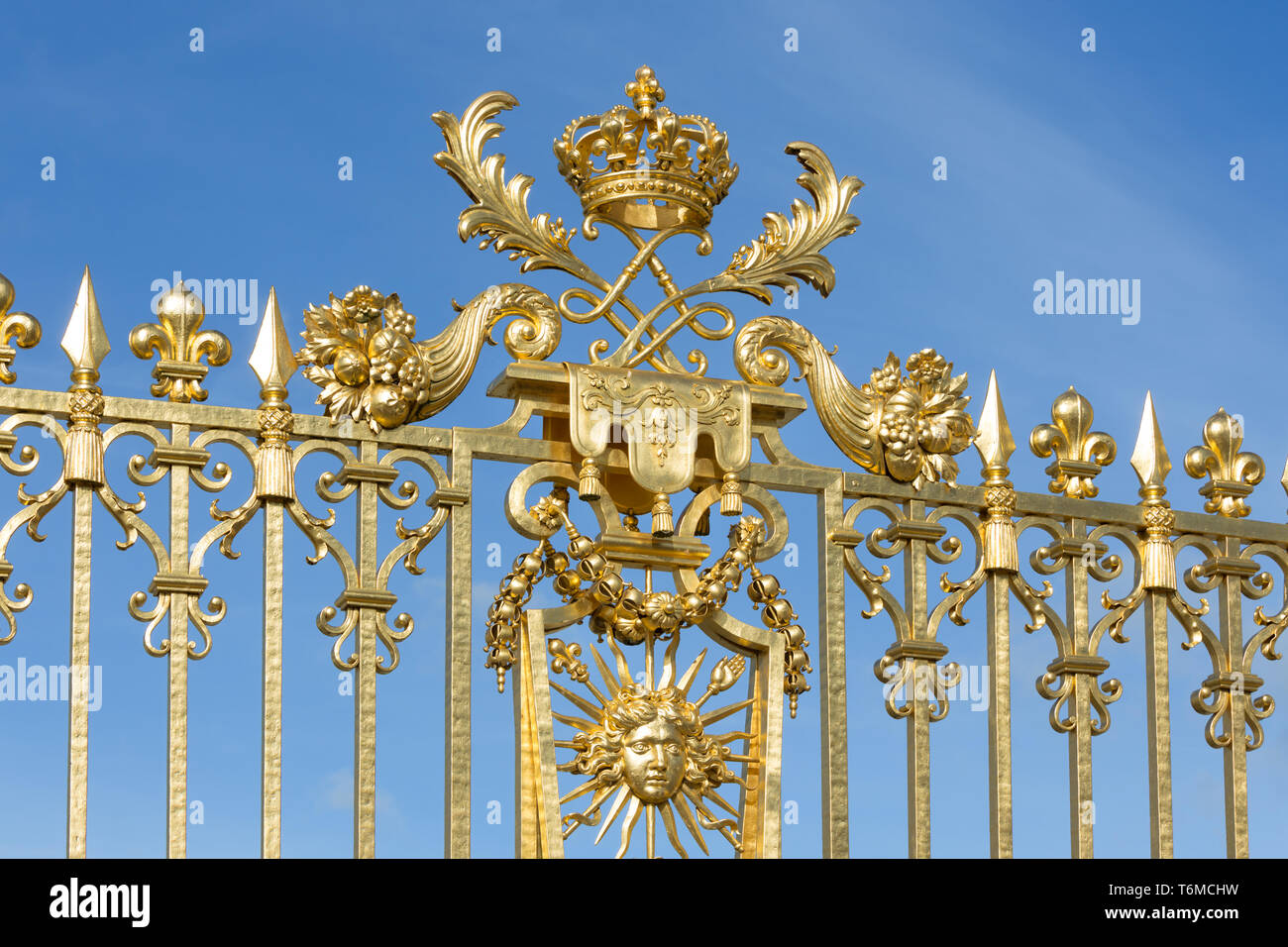Golden gate with ornament Palace Versailles near Paris, France Stock ...