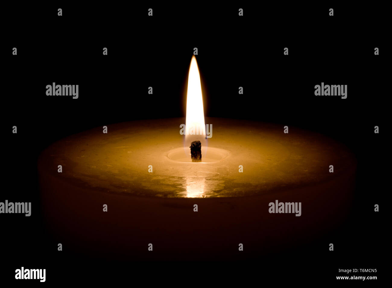 Candlelight in the dark Stock Photo - Alamy