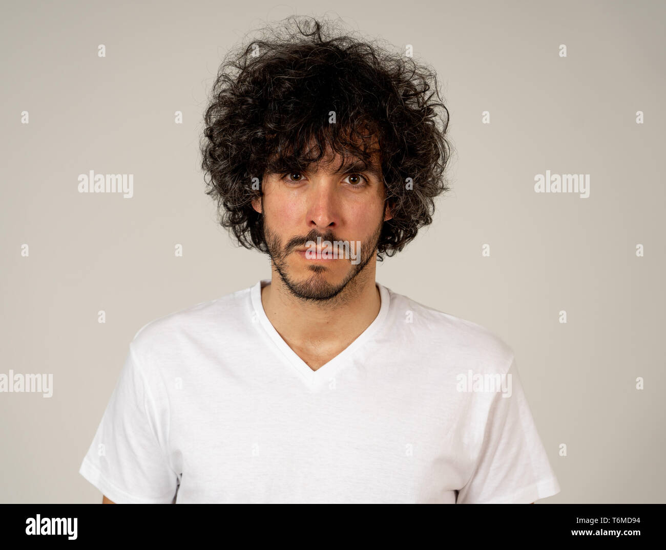 Annoyed young millennial man with an angry face looking mad and furious ...