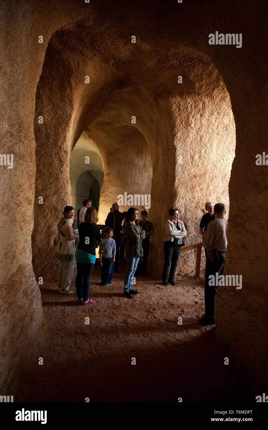 Visitors at Piusa sandstone caves, PÃµlva county, South Estonia Stock ...