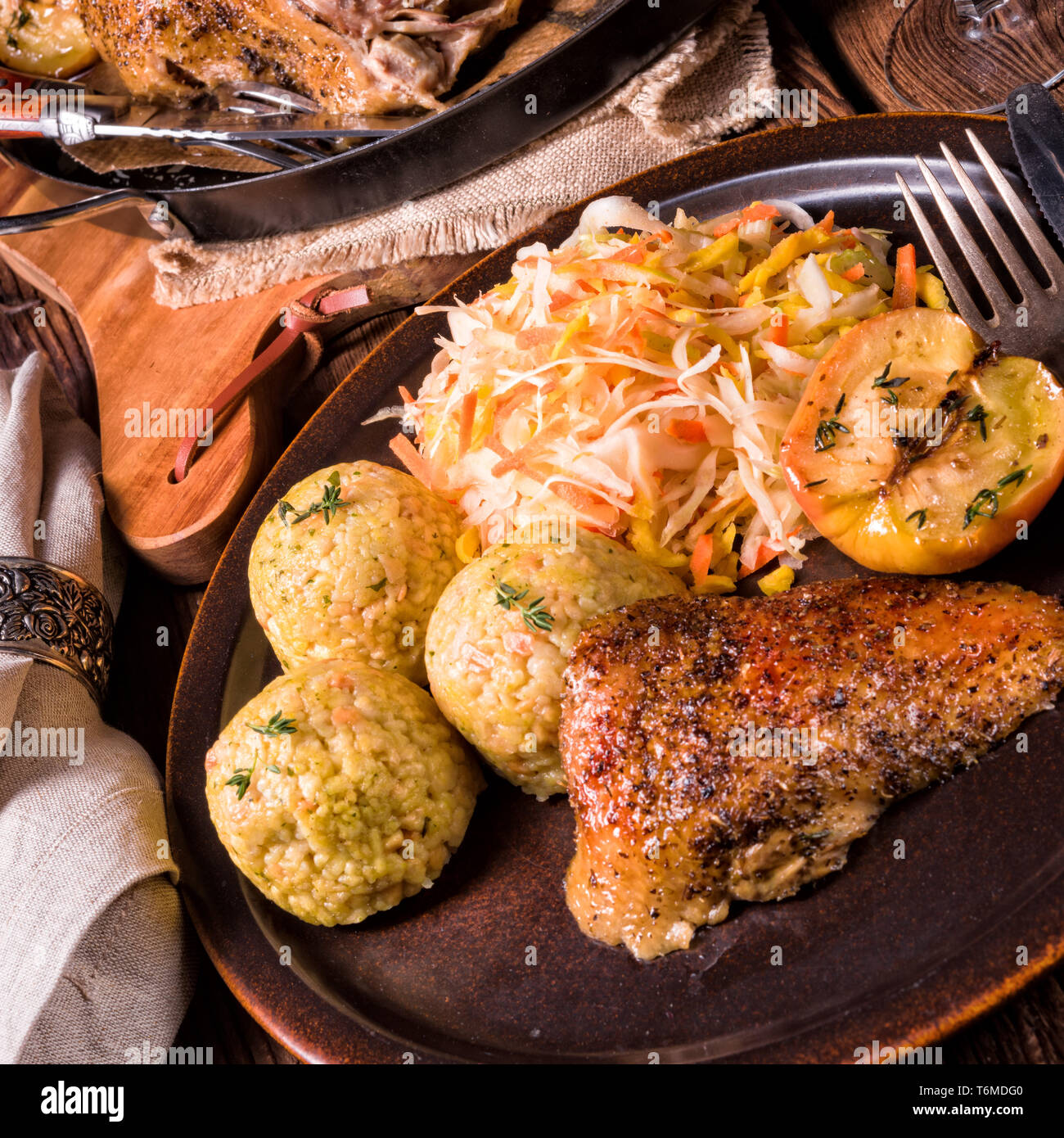 classic and crispy roasted duck with cabbage and dumplings Stock Photo ...