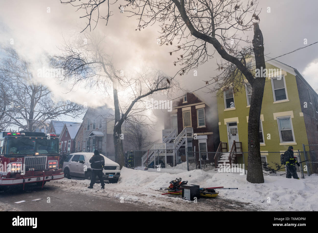Chicago Fire Department responding to a house fire in the Little ...