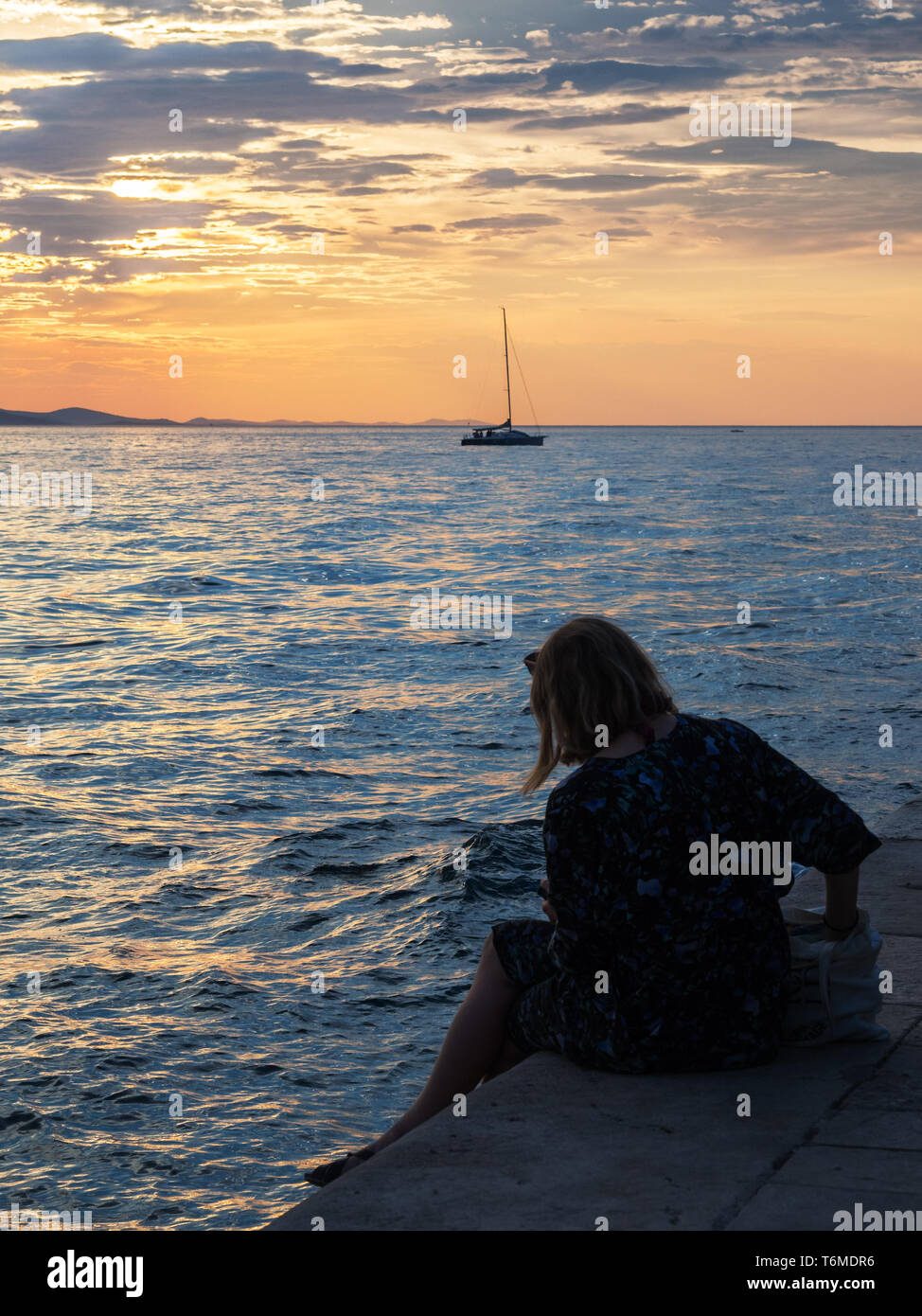 Sunset at zadar Stock Photo - Alamy
