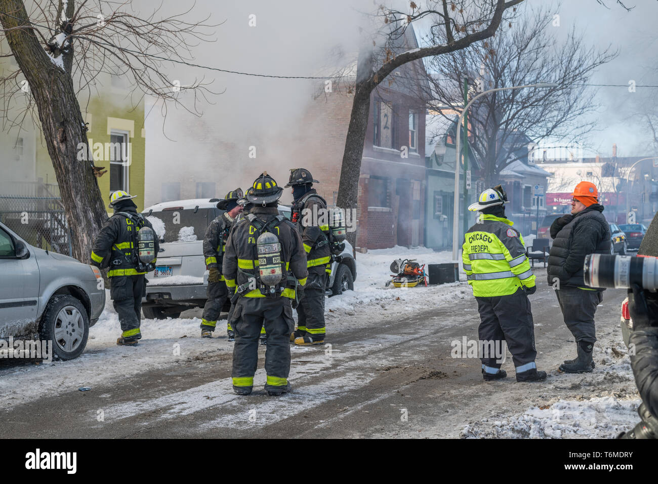 Chicago Fire Department responding to a house fire in the Little ...