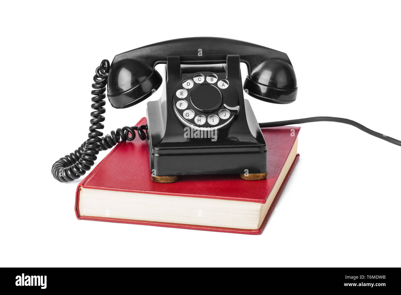Vintage telephone and book Stock Photo - Alamy
