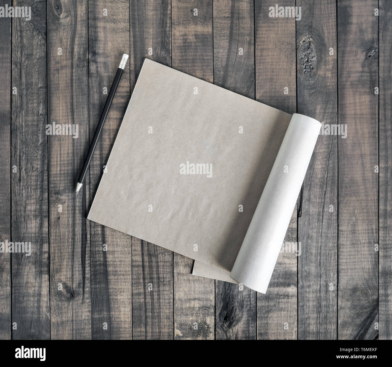 Notepad and pencil Stock Photo - Alamy