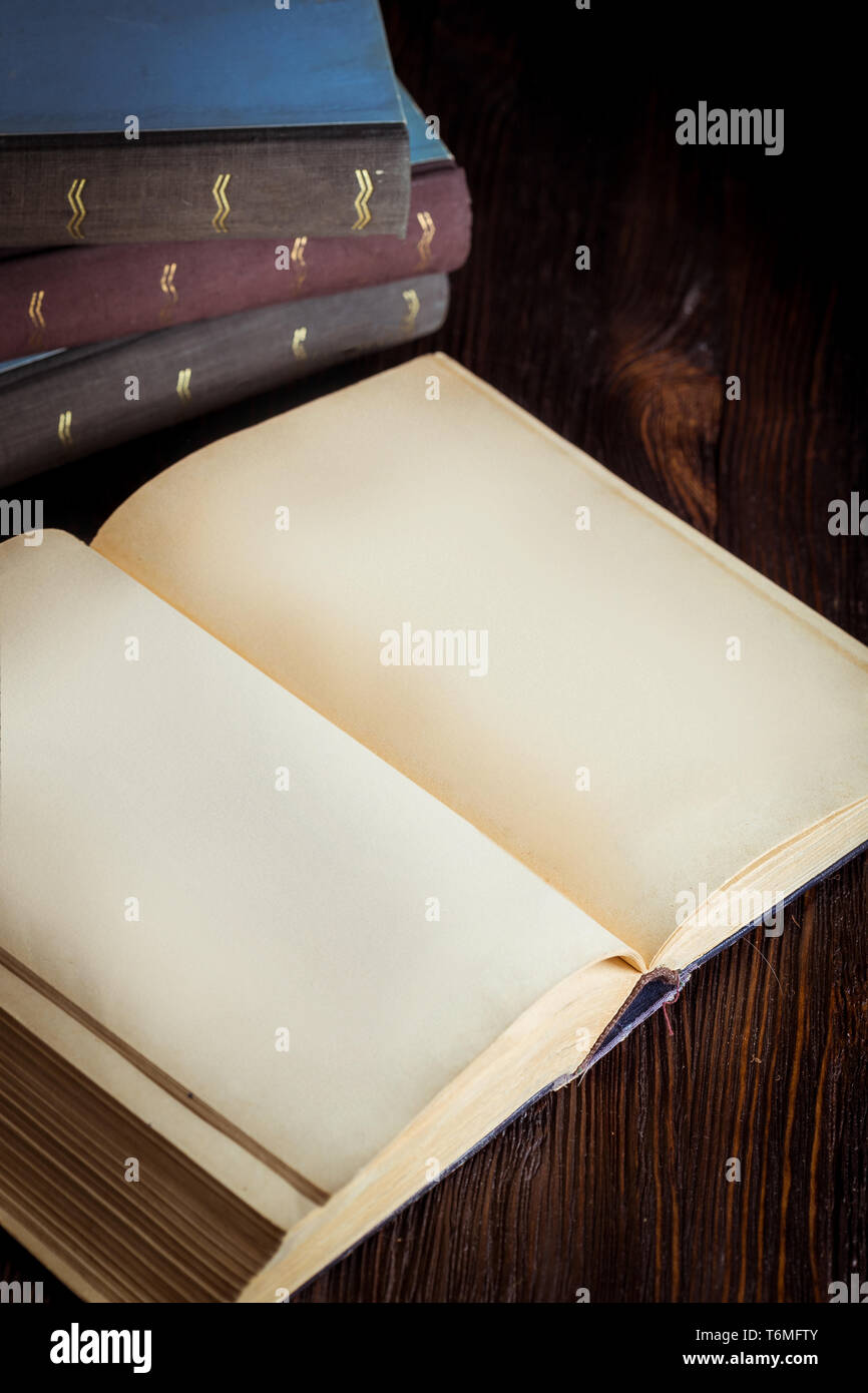 Open book in vintage light tone color Stock Photo - Alamy