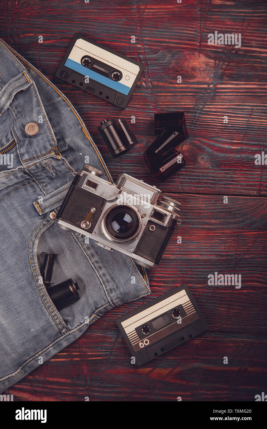 Old vintage camera, jeans and Cassette tape Stock Photo - Alamy