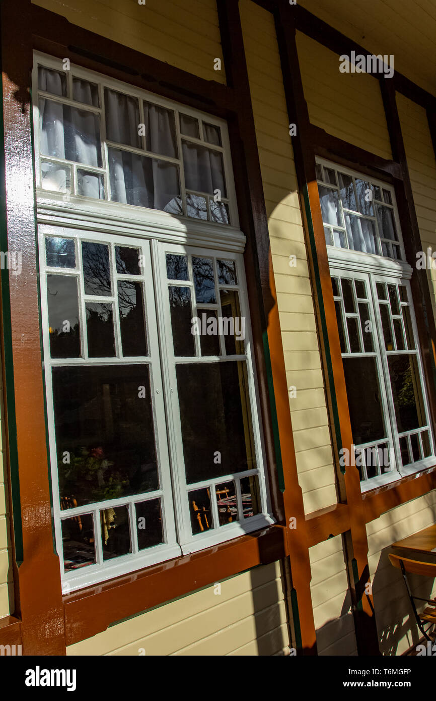 White window with brown wooden frame Stock Photo - Alamy