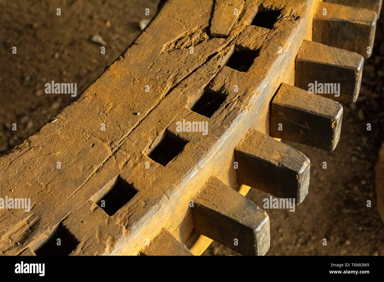 Wooden gear wheels. An ancient wooden rotating gear wheel at the mill ...
