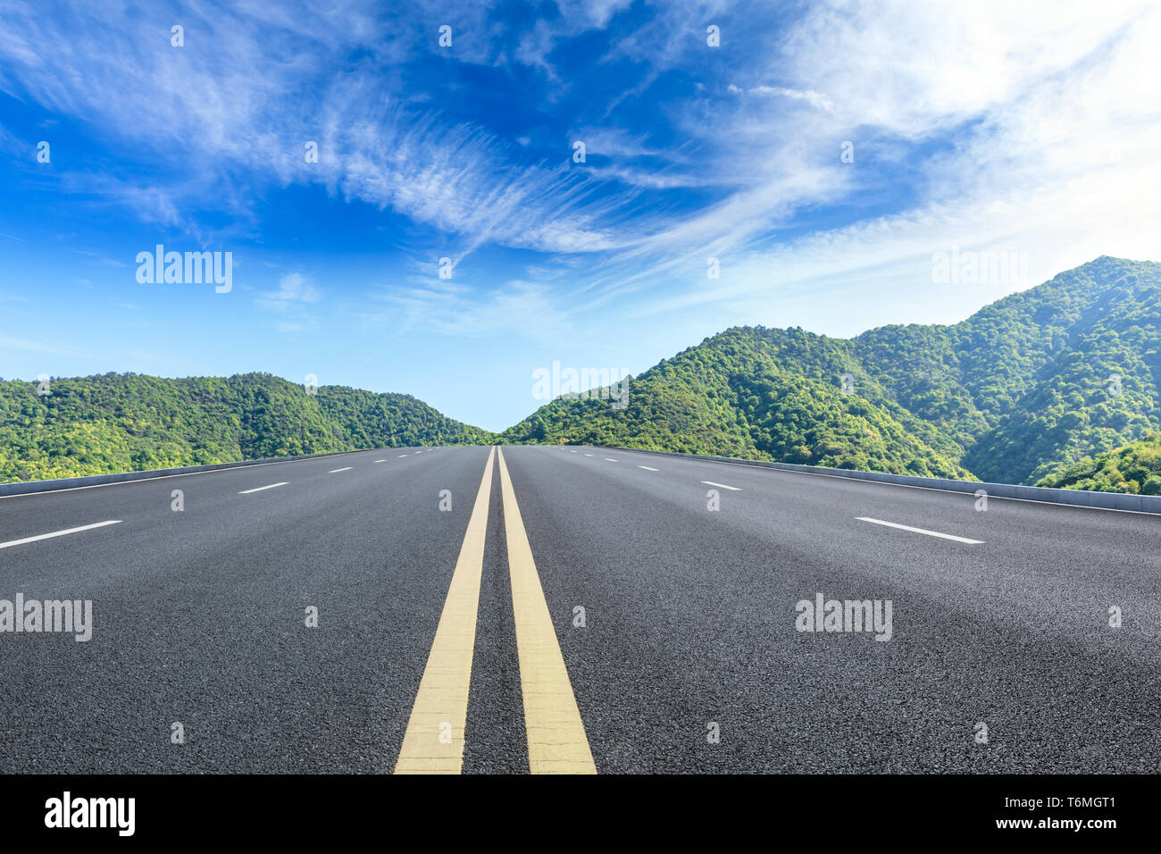Straight highway and beautiful mountain natural landscape Stock Photo ...