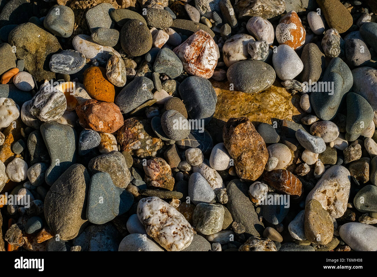 Pebbles stone background Stock Photo - Alamy