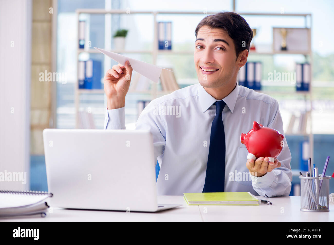 Sales agent working in travel agency Stock Photo - Alamy