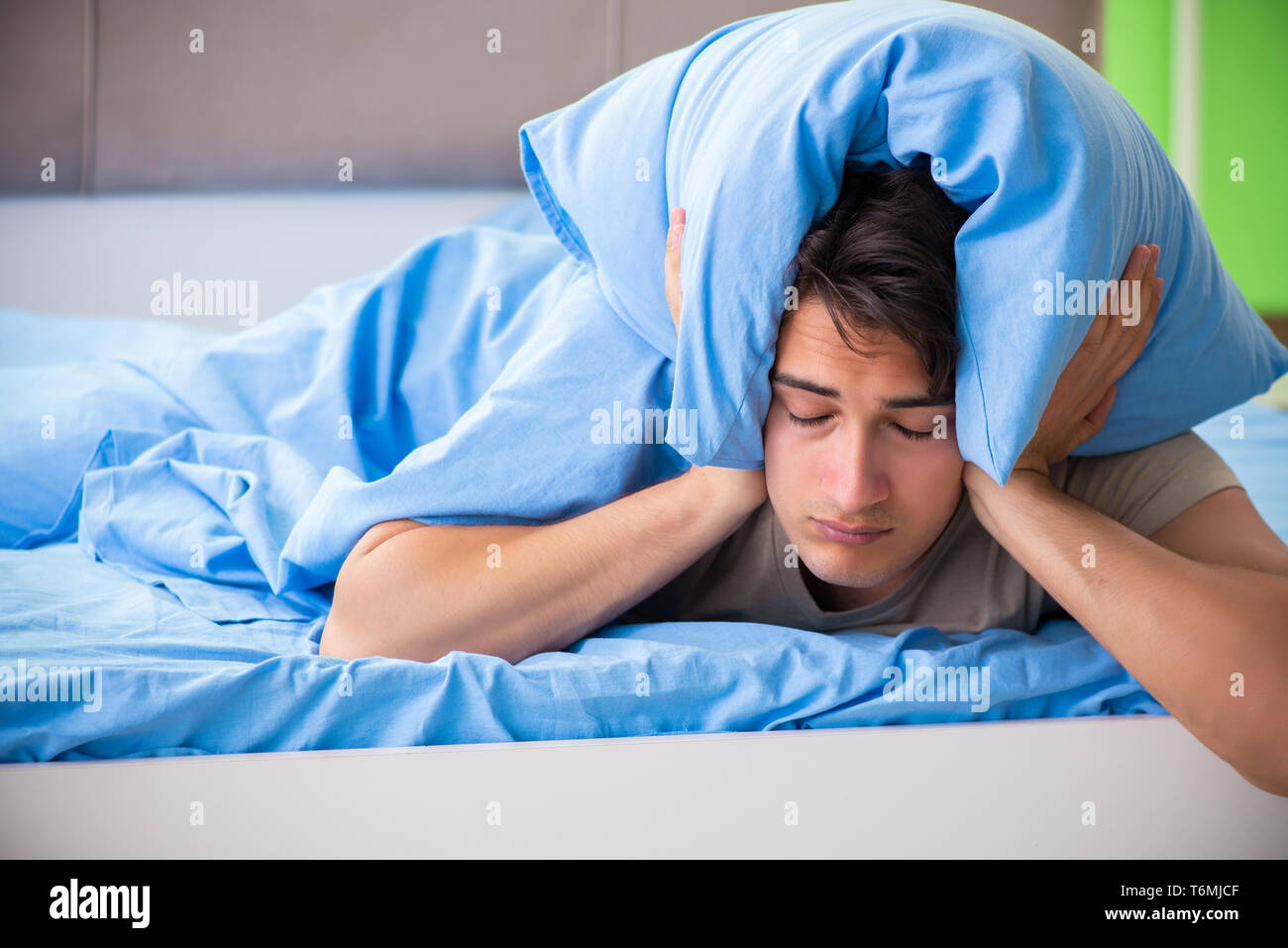Man suffering from sleeping disorder and insomnia Stock Photo - Alamy