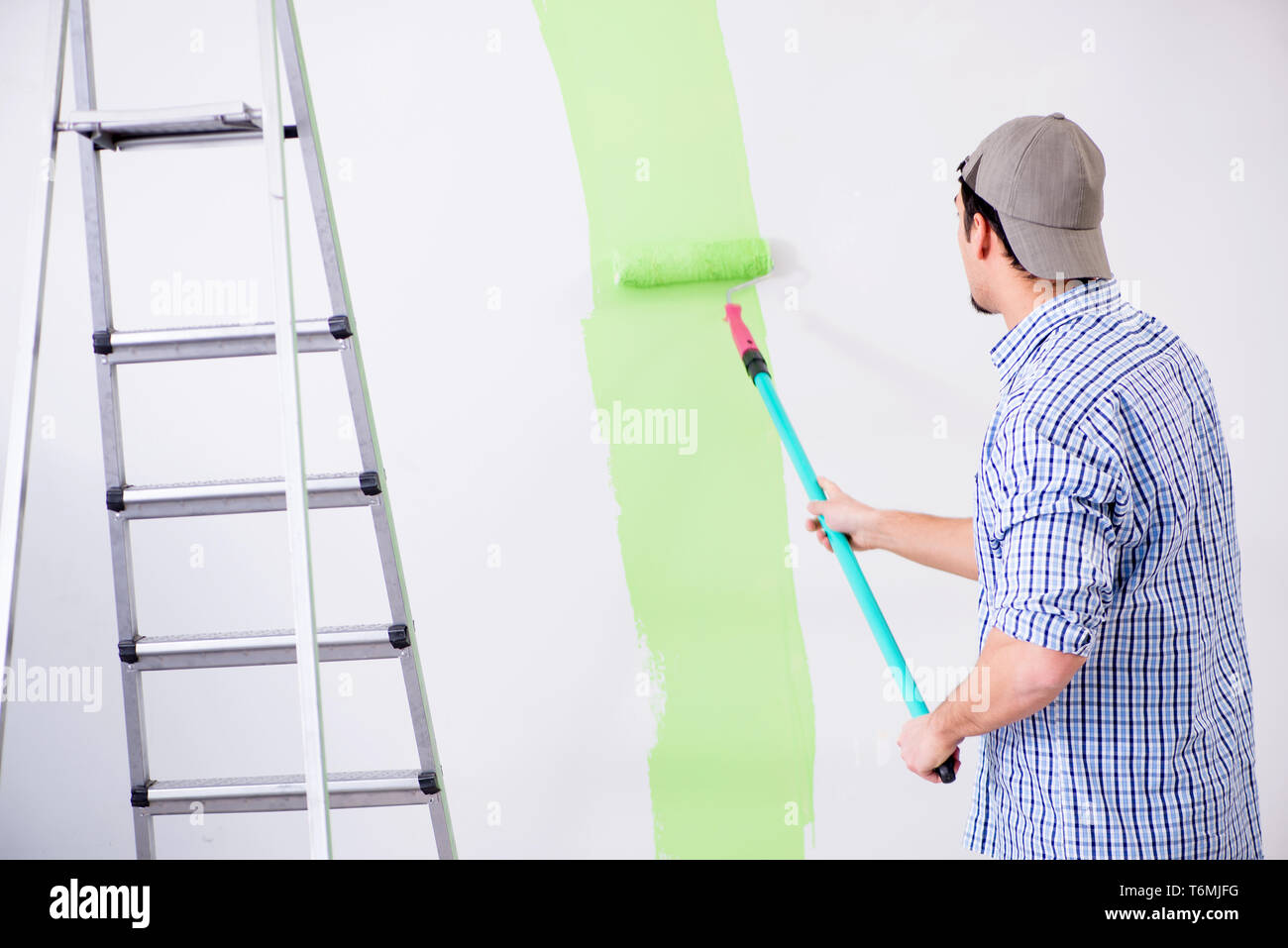 Back view man painter working hi-res stock photography and images - Alamy