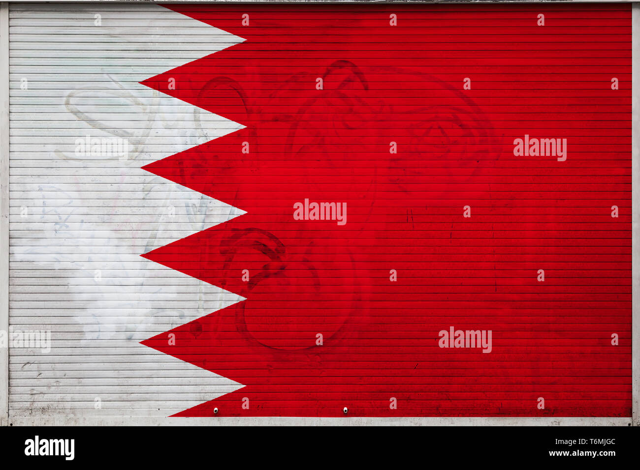 Close-up of old metal wall with national flag of Bahrain. Concept of ...