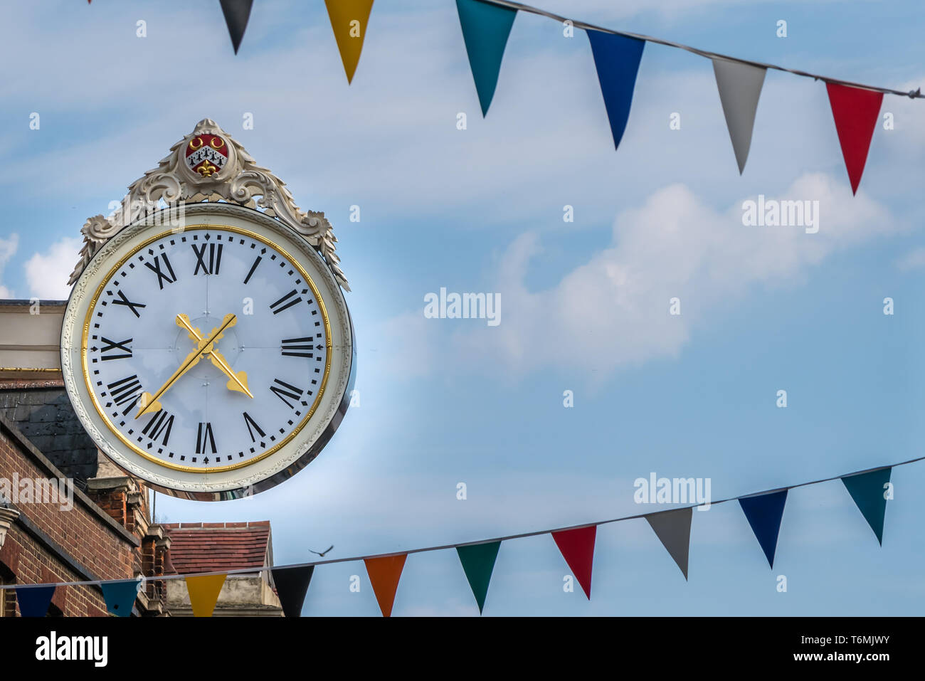 Old antique clock showing time Stock Photo - Alamy