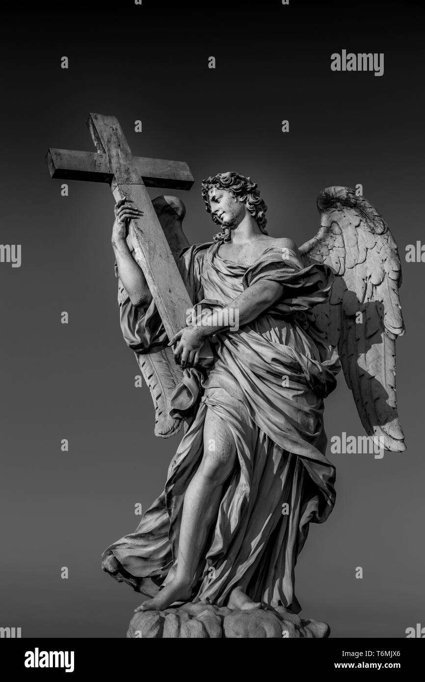 Catholic angel with cross Stock Photo - Alamy